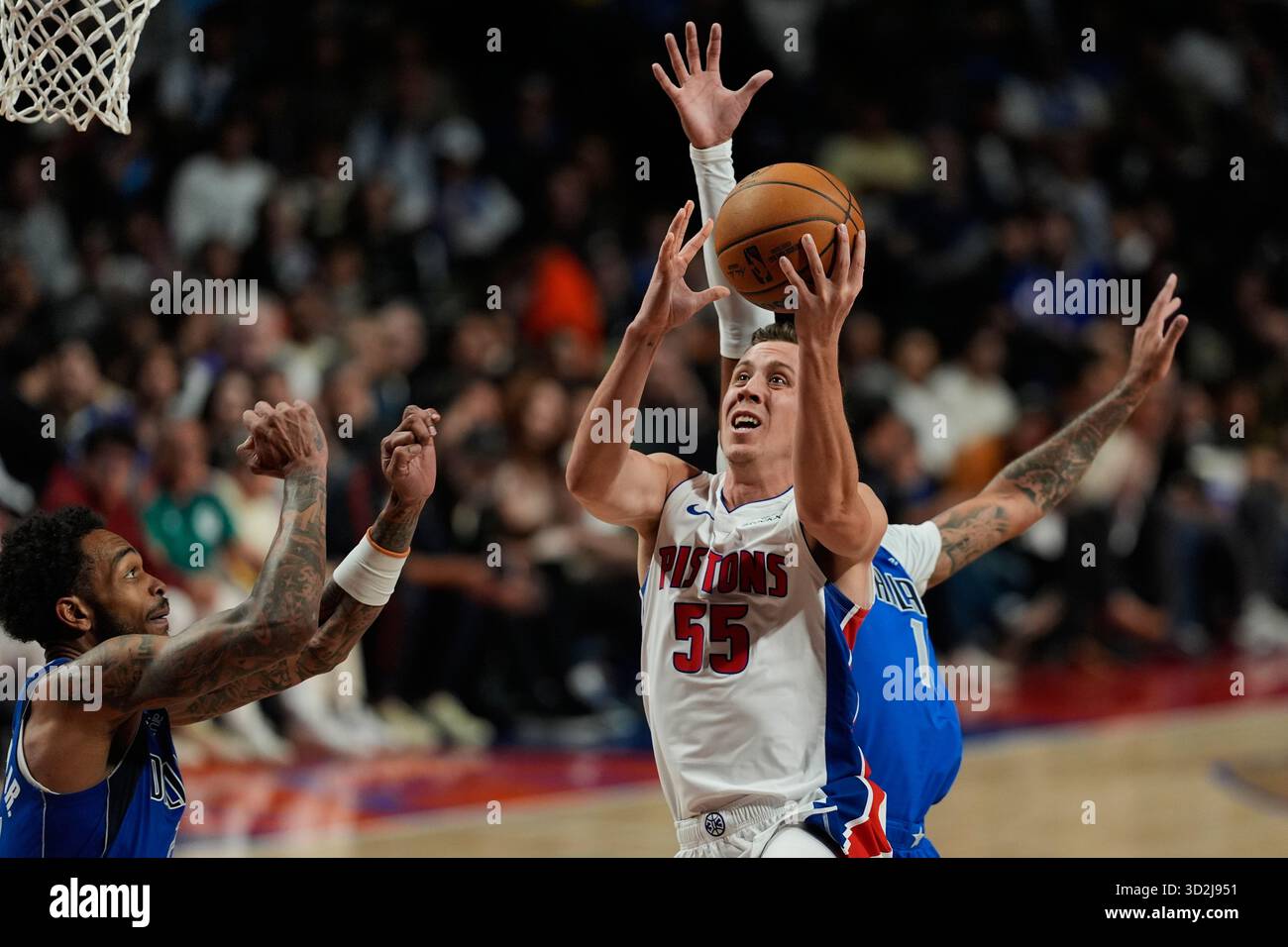 Detroit Pistons forward Duncan Robinson (55) goes up for a shot against ...