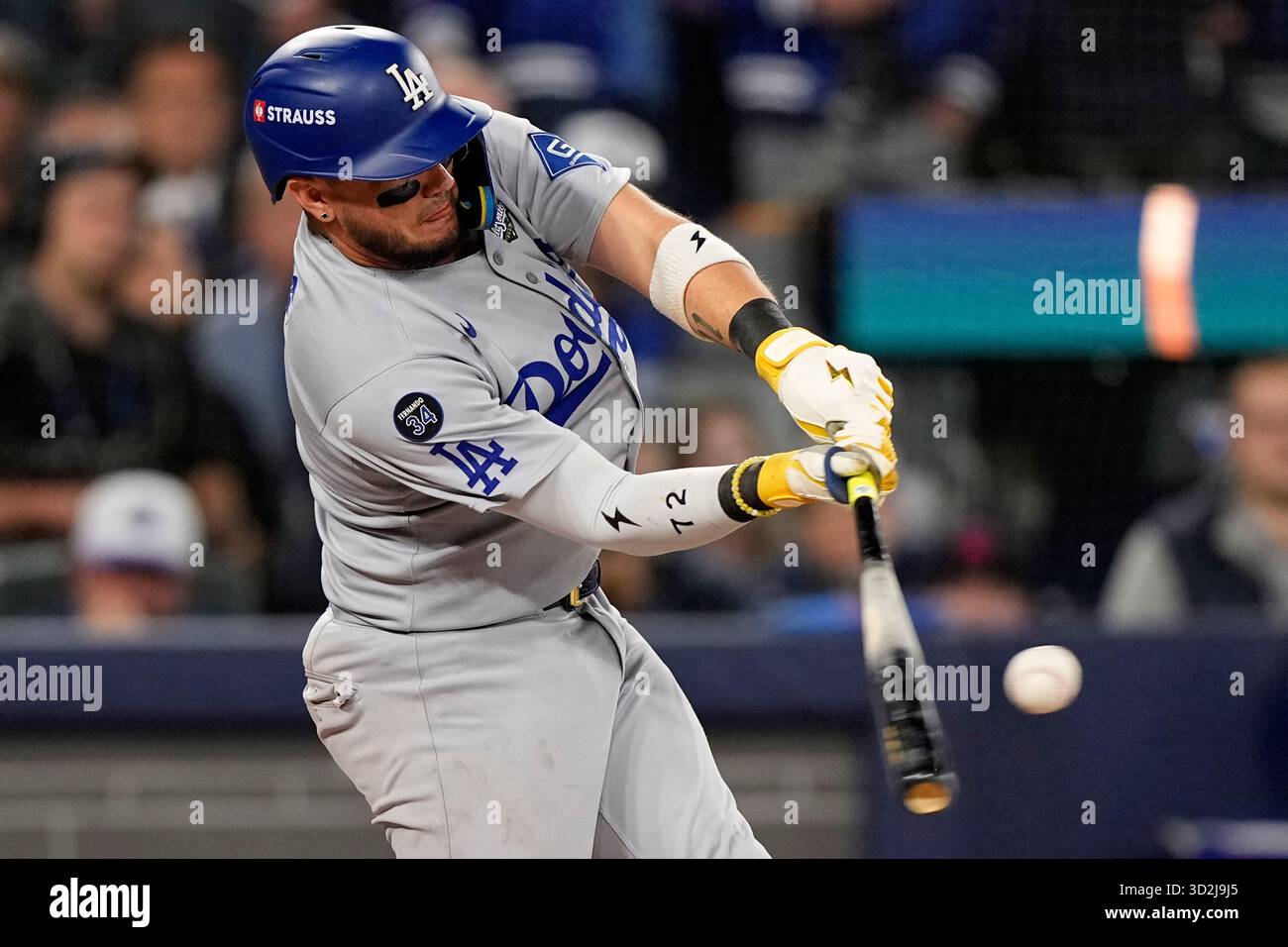 Los Angeles Dodgers' Miguel Rojas hits a home run against the Toronto ...