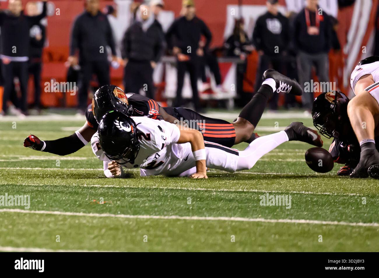 Cincinnati quarterback Brendan Sorsby (2) fumbles the football as he is ...