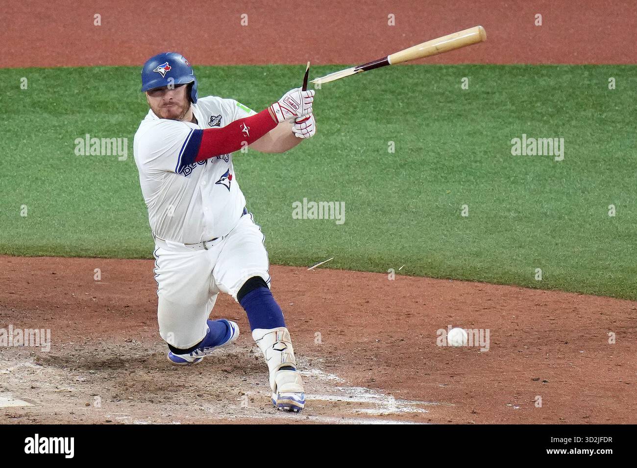 Toronto Blue Jays' Alejandro Kirk breaks his bat as he grounds out into ...