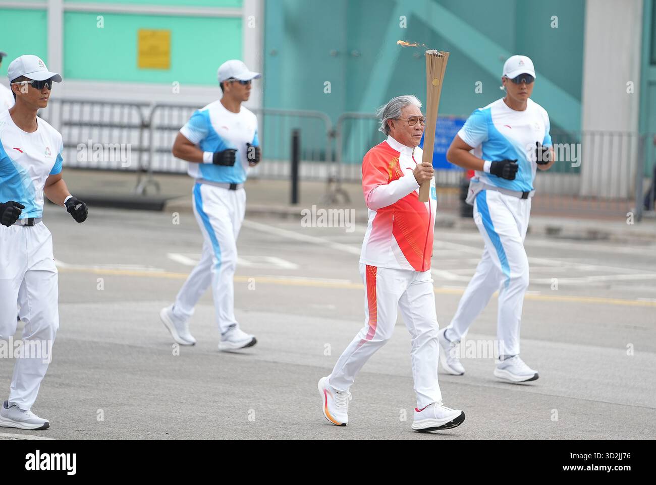 Hong Kong, China. 2nd Nov, 2025. Torch bearer Timothy Fok Tsun-ting ...