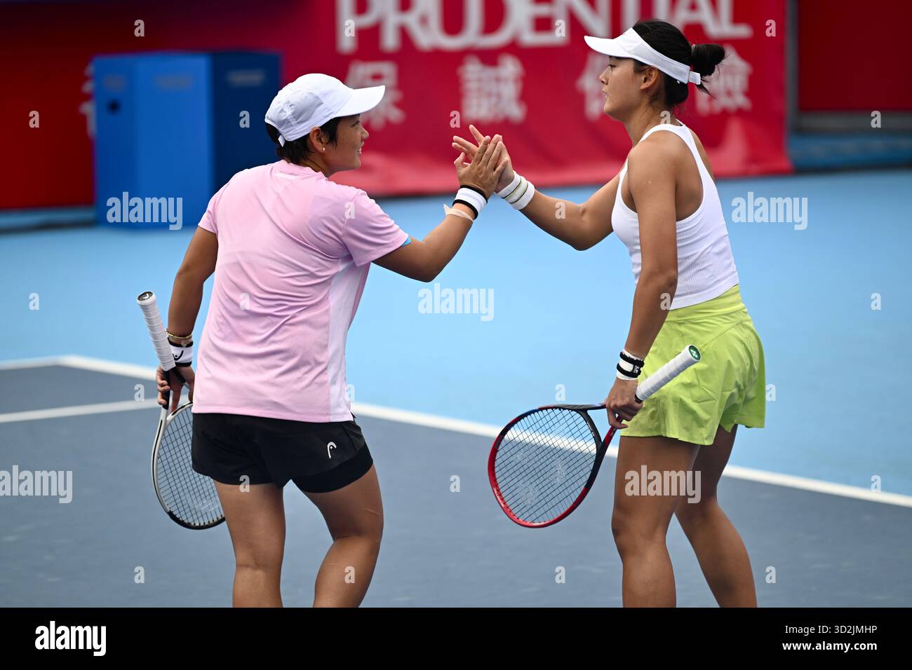 Chinese tennis player Xinyu Jiang and Yafan Wang during a match at the ...