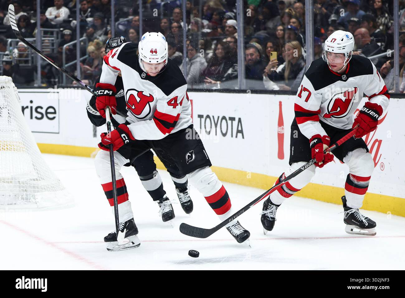 New Jersey Devils defenseman Dennis Cholowski (44) and defenseman Simon ...