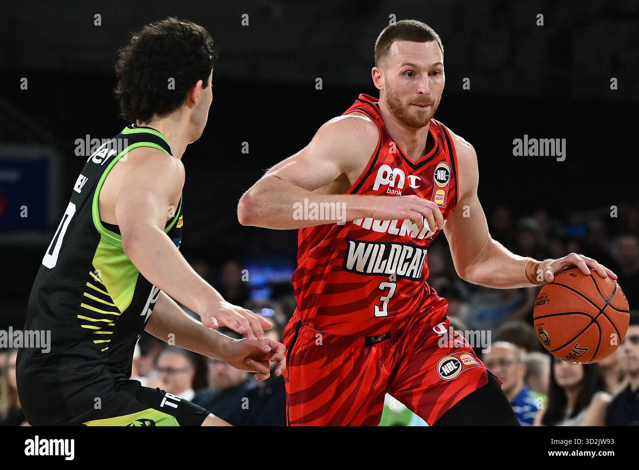 Dylan Windler of the Wildcats (right) during the NBL Round 7 match ...