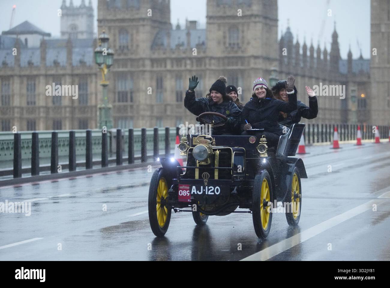 Participants drive over Westminster Bridge in London, as they take part ...