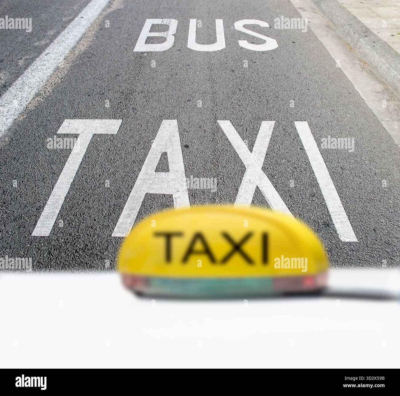 a taxi cab circulating bus lane Stock Photo - Alamy