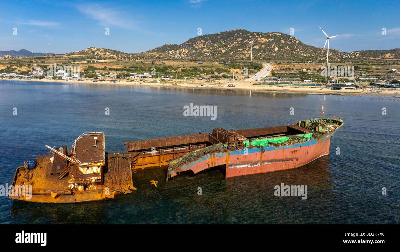 Rusting shipwreck near Phan Rang, Vietnam—broken cargo vessel, coastal ...