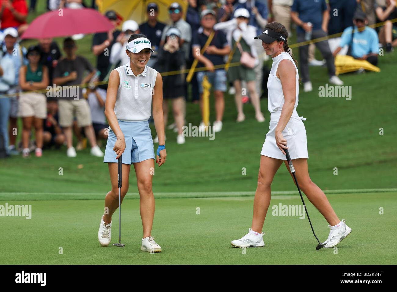 KUALA LUMPUR, - NOVEMBER 02: Lydia Ko of New Zealand and Linn Grant of ...