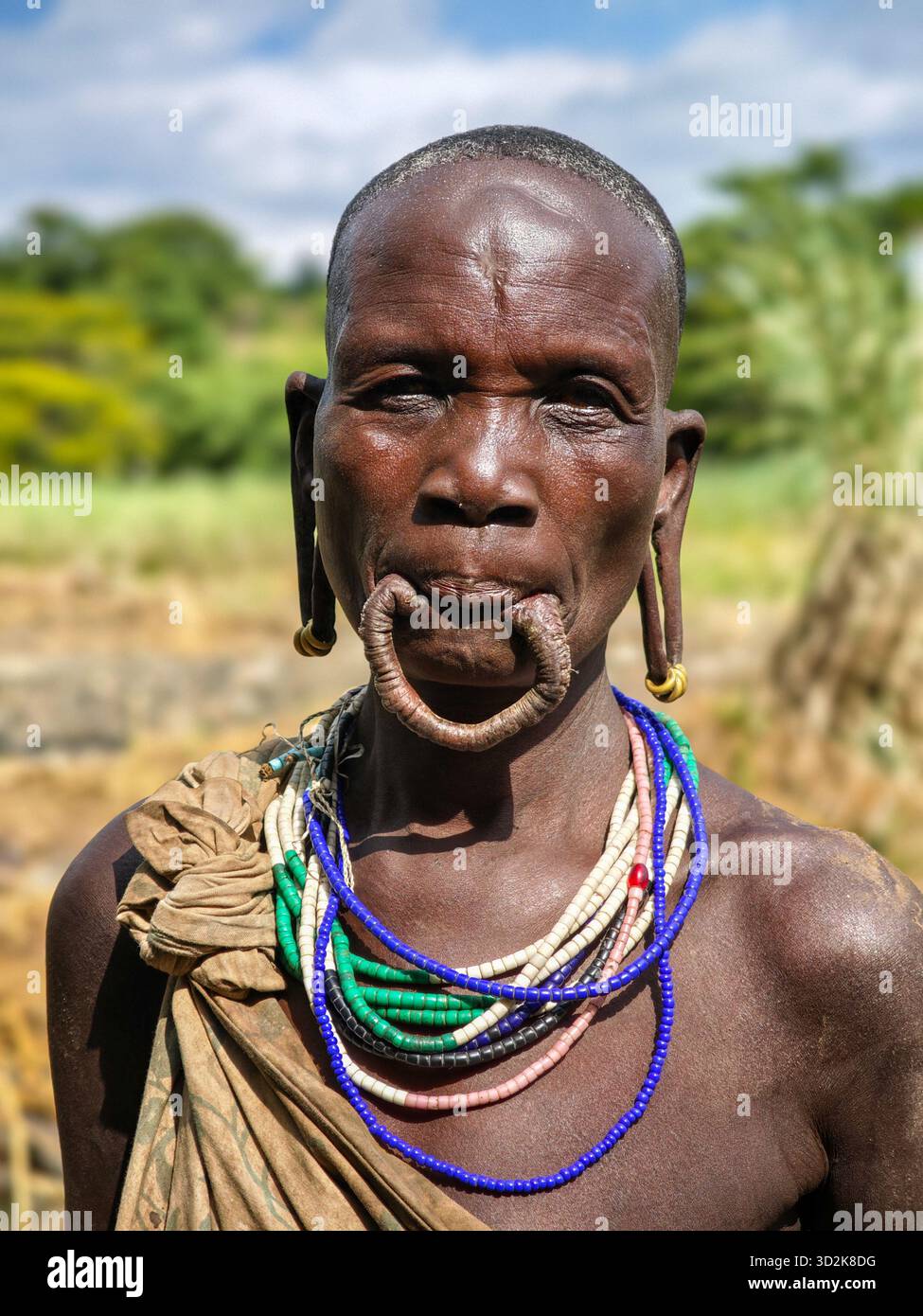 Kibish, Ethiopia - 12 August 2025: portrait of Suri tribe woman at ...