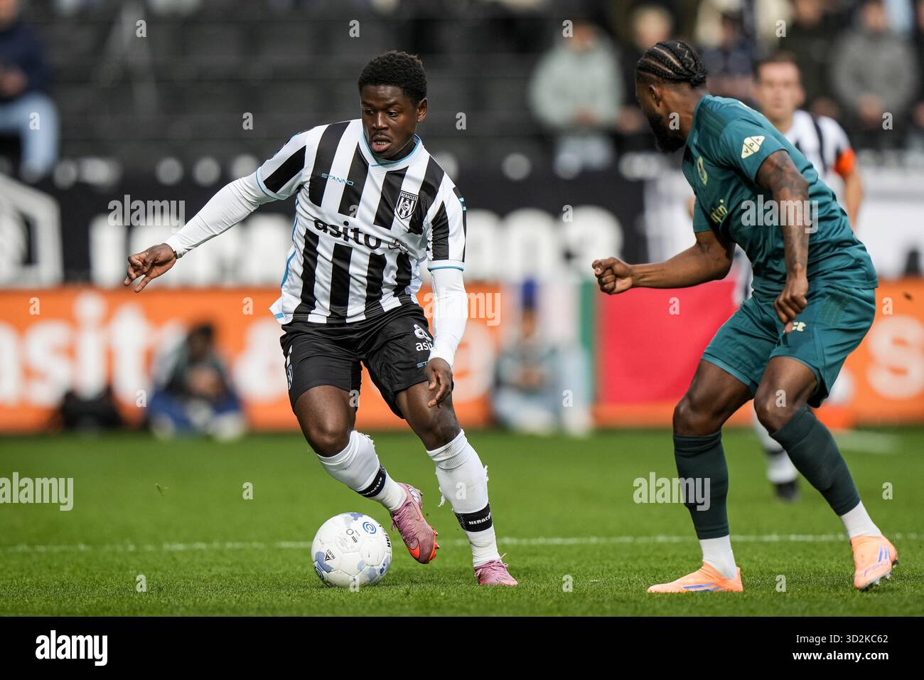 ALMELO - (L-R) Bryan Limbombe of Heracles Almelo, Sherel Floranus of ...