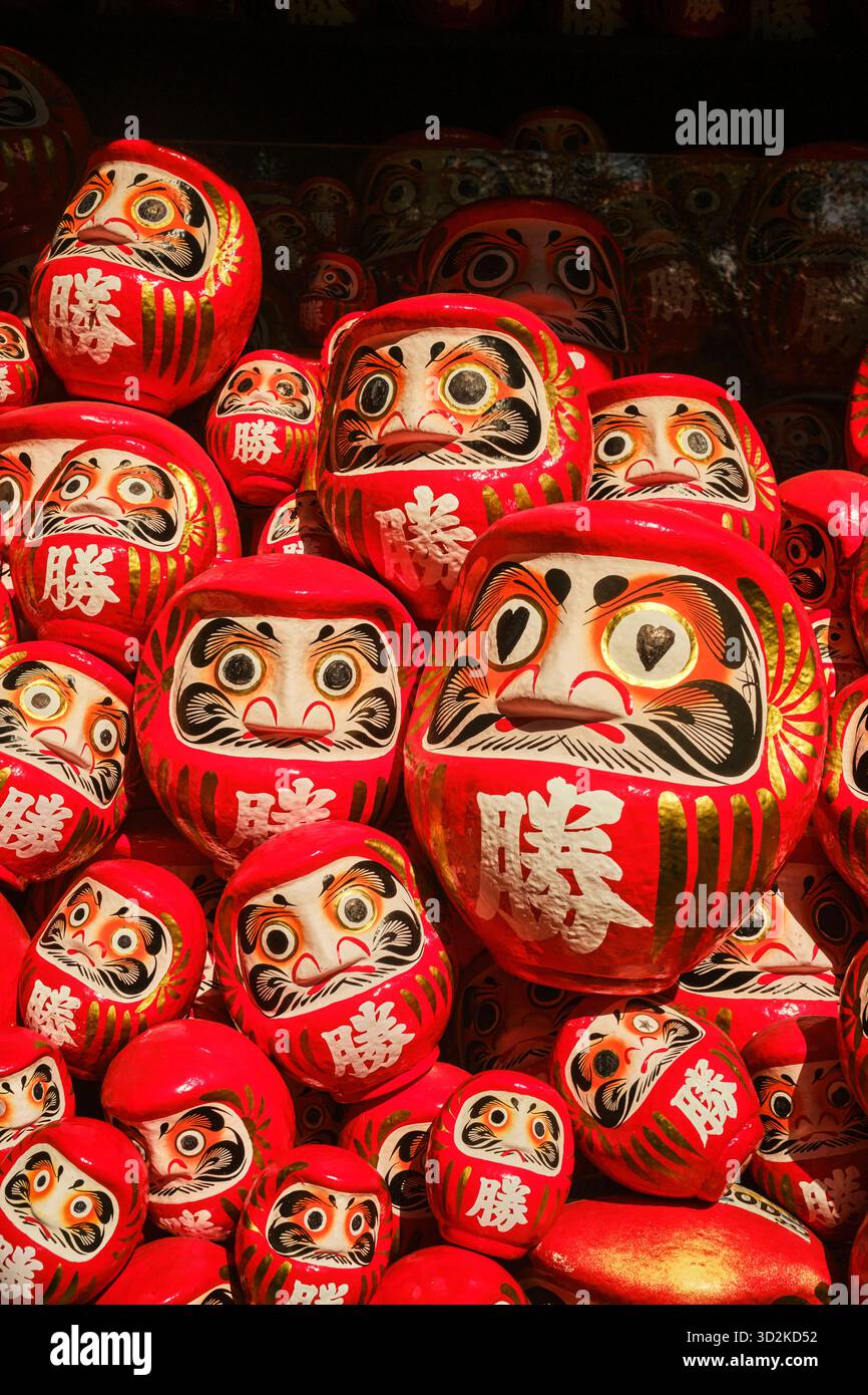 A stack of traditional Daruma dolls at Katsuoji Temple in Osaka, Japan ...