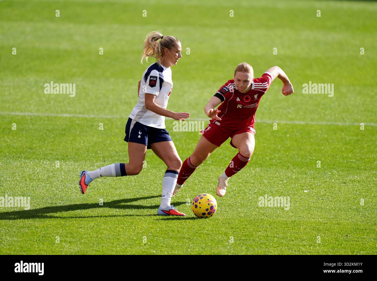 Tottenham Hotspur's Amanda Nilden (left) and Liverpool's Ceri Holland ...