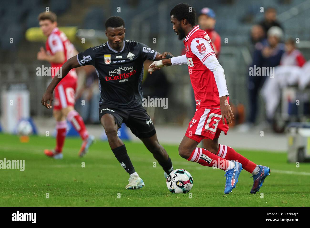 Austrian Bundesliga football match between Grazer AK 1902 and SCR Altach. Dynamic game moments ...