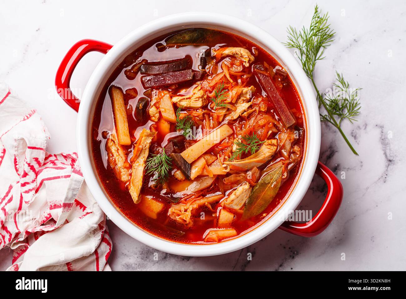 Classic homemade borscht with chicken in a red pot, top view Stock ...