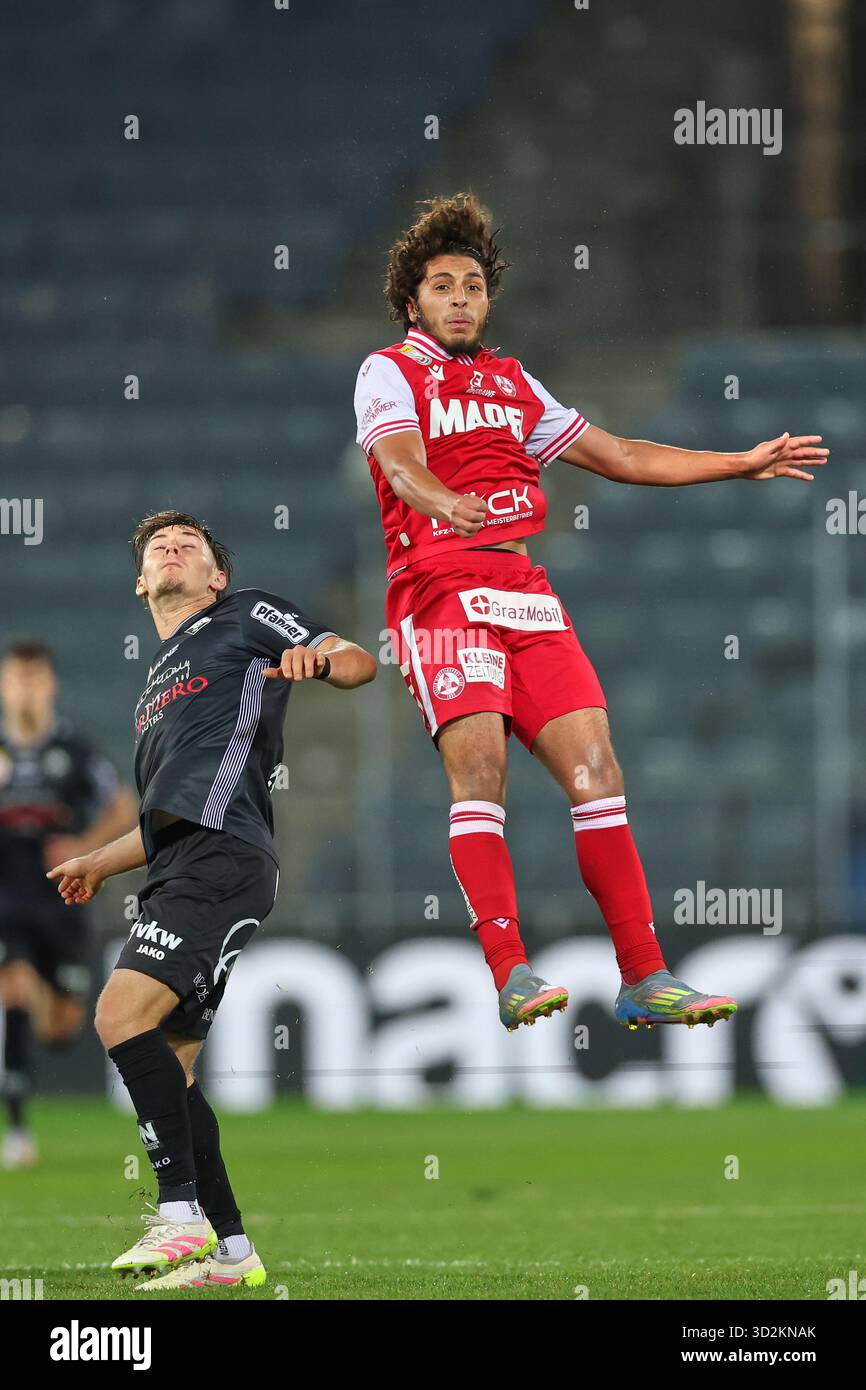 Austrian Bundesliga football match between Grazer AK 1902 and SCR Altach. Dynamic game moments ...