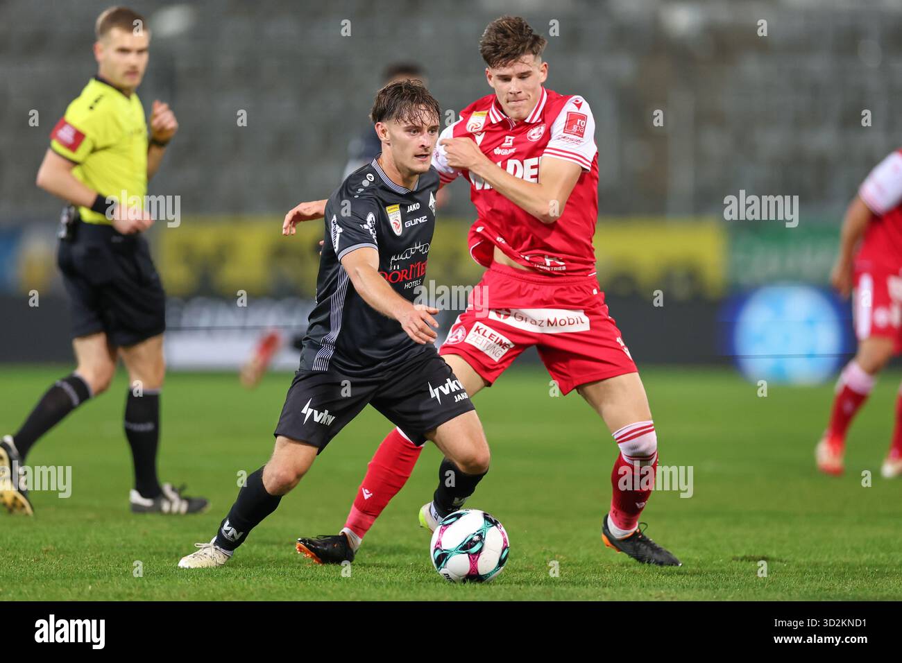 Austrian Bundesliga football match between Grazer AK 1902 and SCR Altach. Dynamic game moments ...
