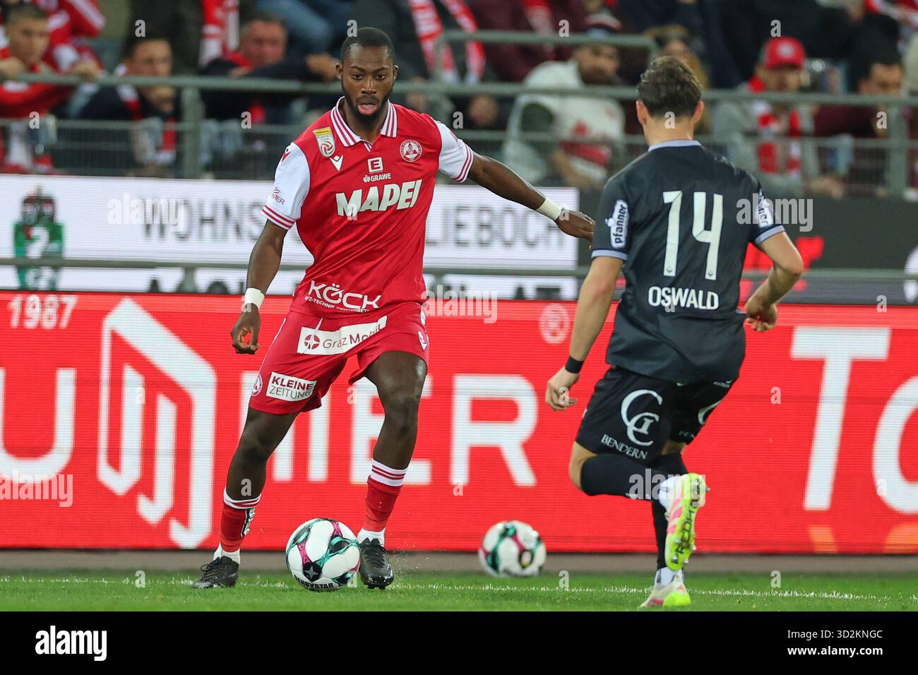 Austrian Bundesliga football match between Grazer AK 1902 and SCR Altach. Dynamic game moments ...
