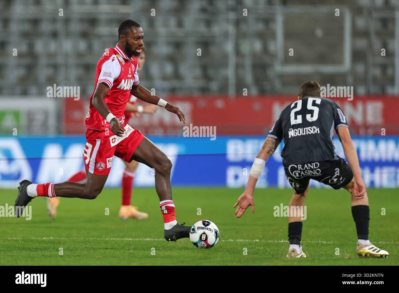 Austrian Bundesliga football match between Grazer AK 1902 and SCR Altach. Dynamic game moments ...