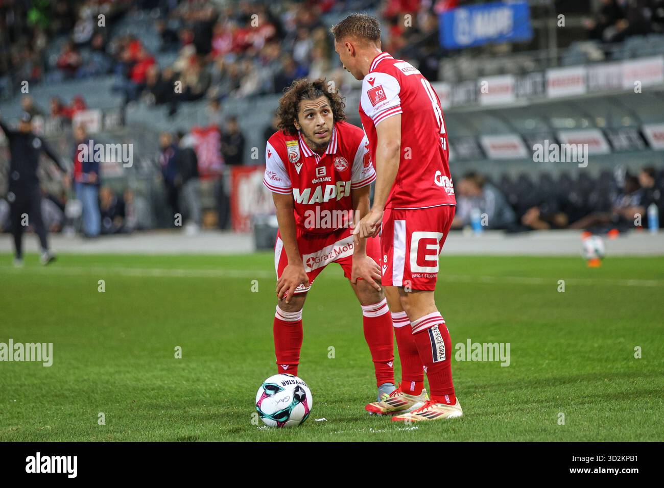 Austrian Bundesliga football match between Grazer AK 1902 and SCR Altach. Dynamic game moments ...