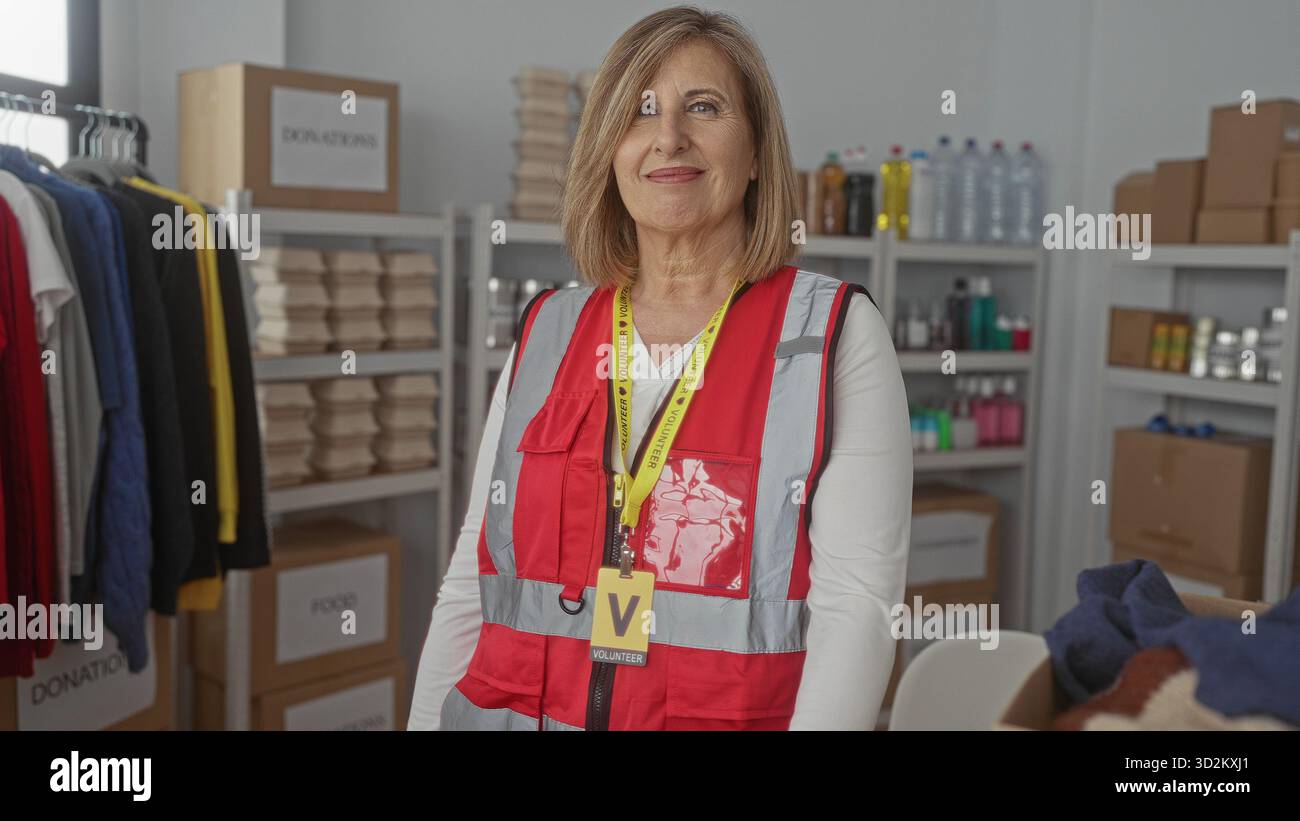 Woman points finger at camera in indoor donation center with stacked ...