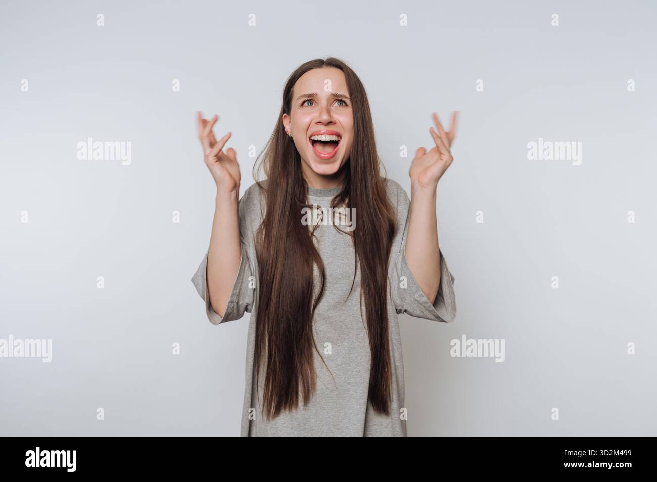 Woman expressing playful mood hi-res stock photography and images - Alamy