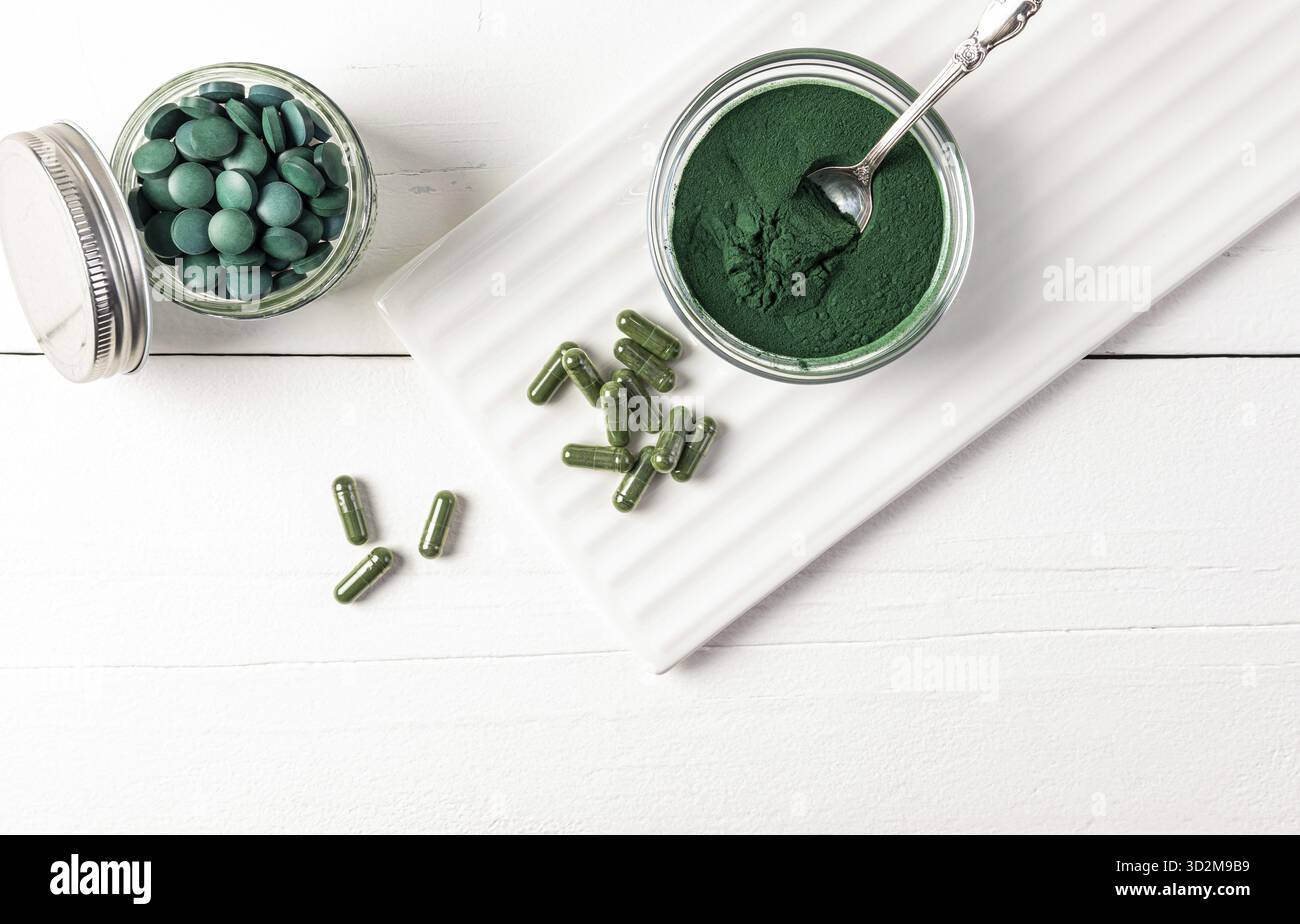Spirulina powder tablets capsules hi-res stock photography and images ...