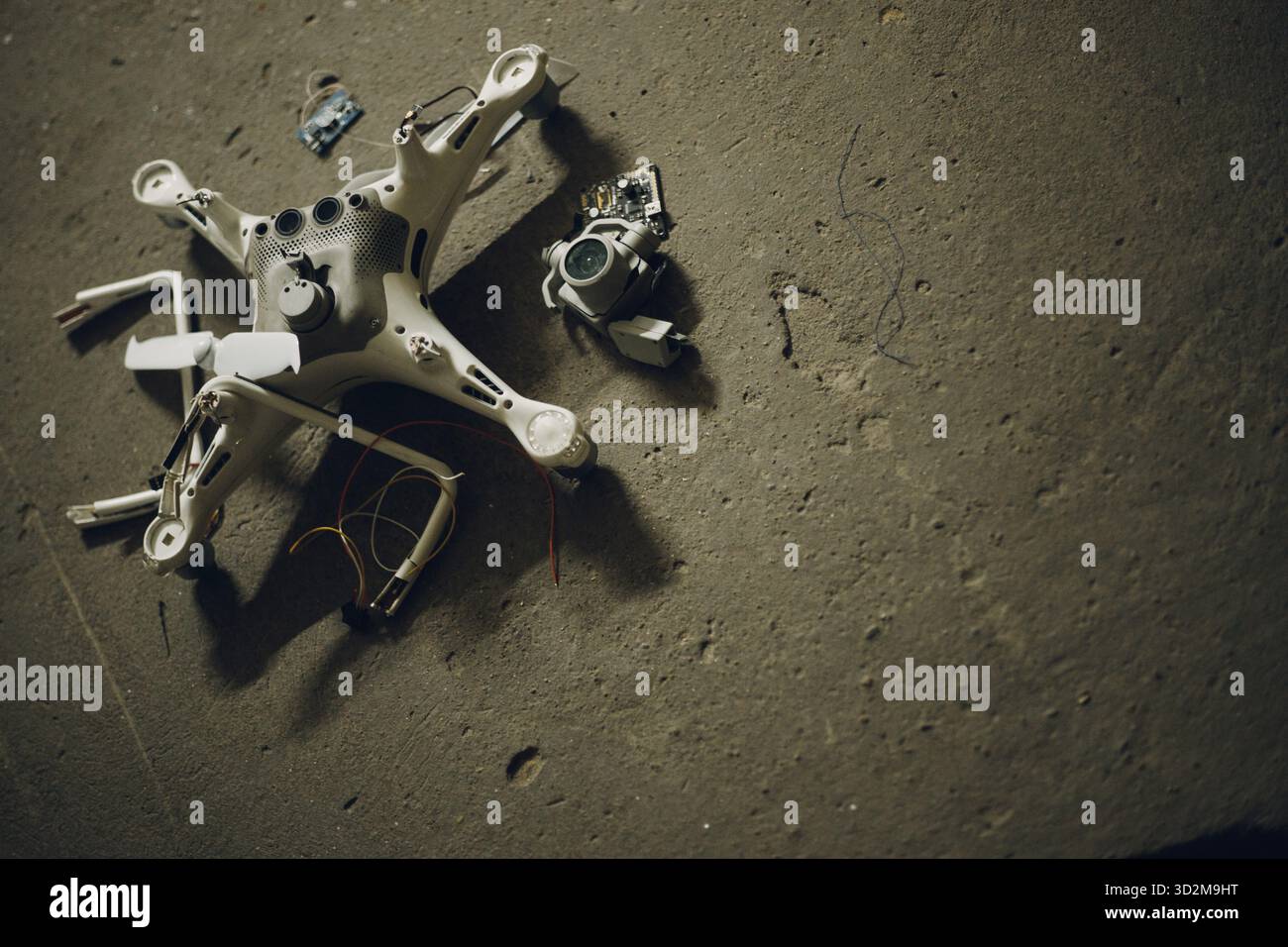 Fallen damaged quadcopter drone crash on floor Stock Photo - Alamy