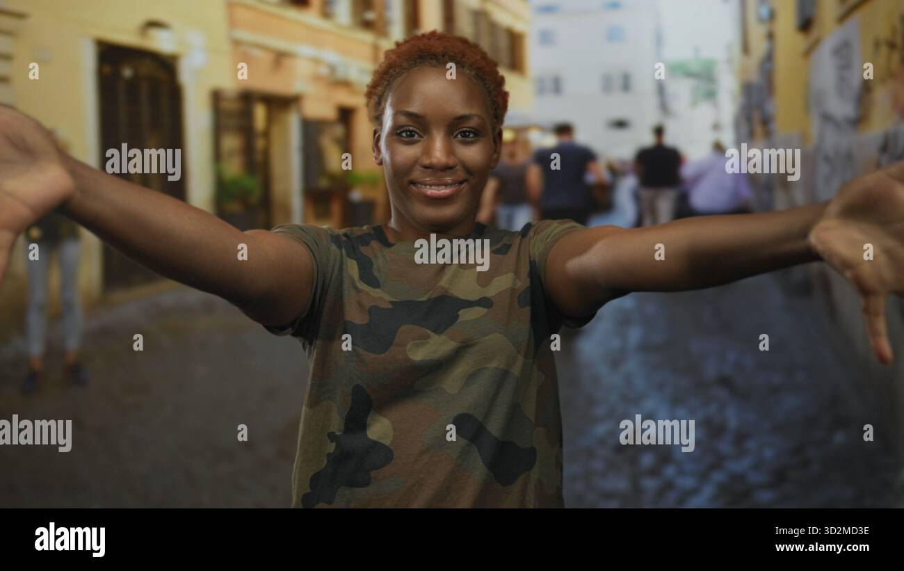 African american woman soldier in camouflage uniform extends arms with ...