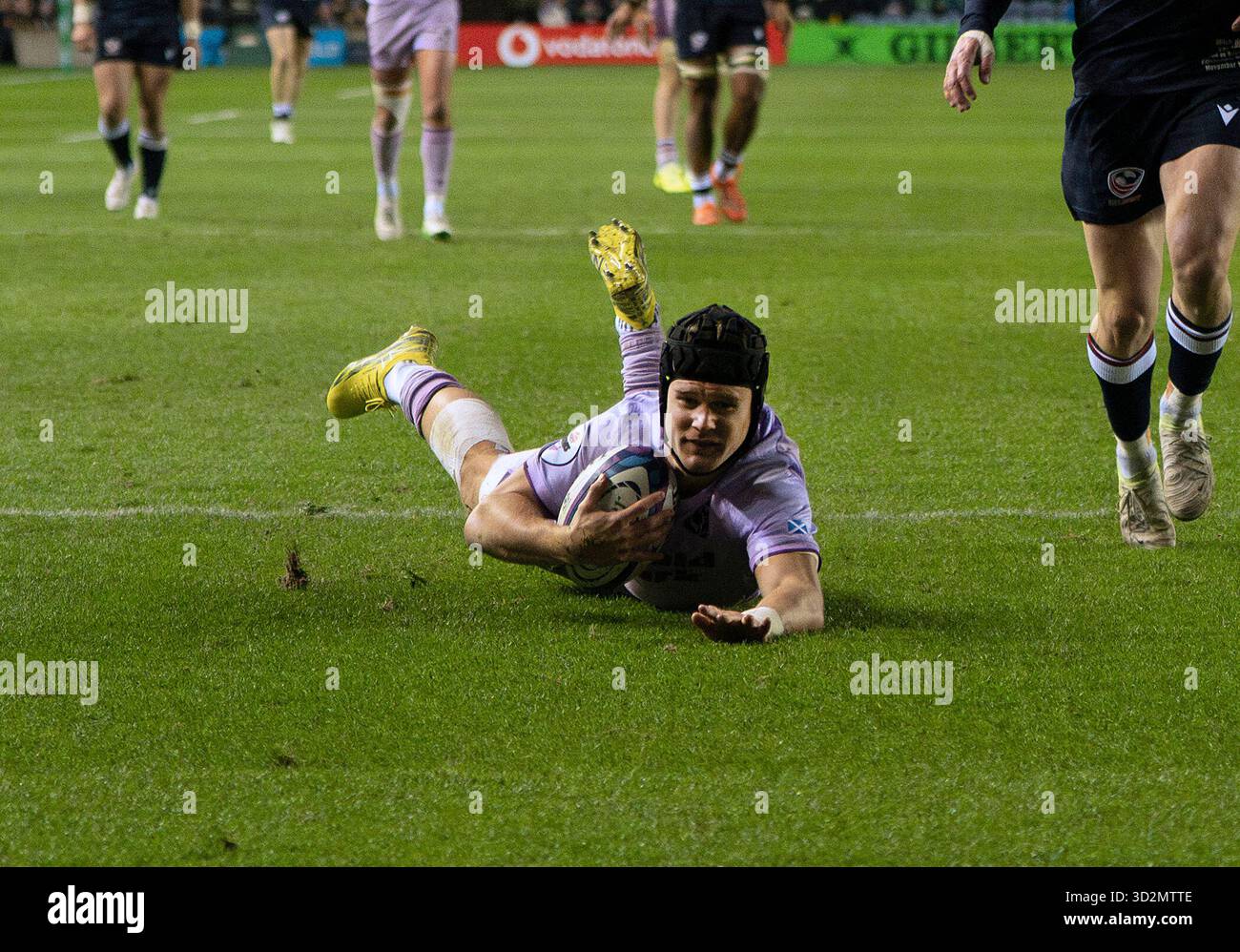Autumn Test - Scotland v USA. Scotland wing, Darcy Graham, dives over ...