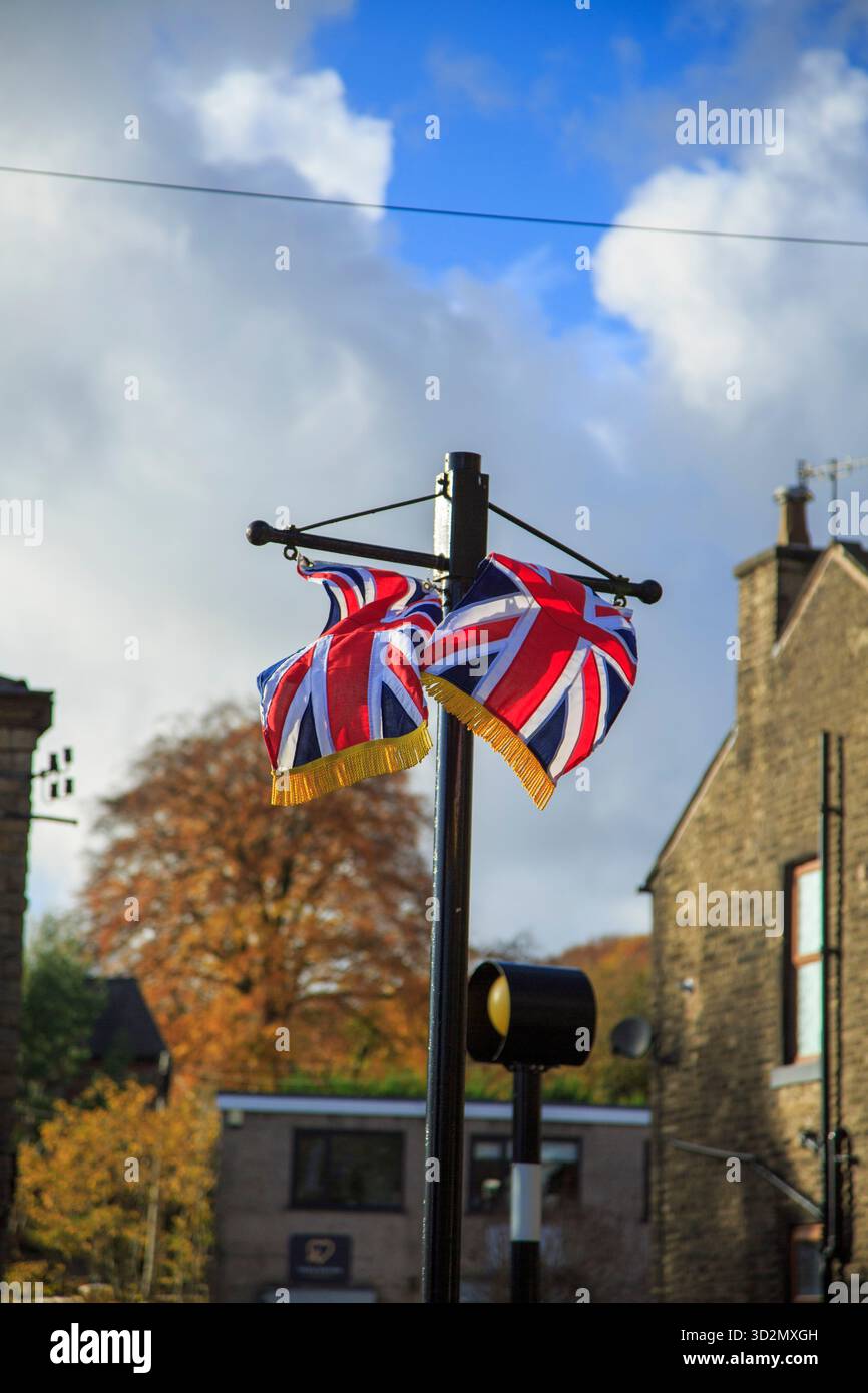 Union Jack flags flutter in golden autumn light ready for the ...
