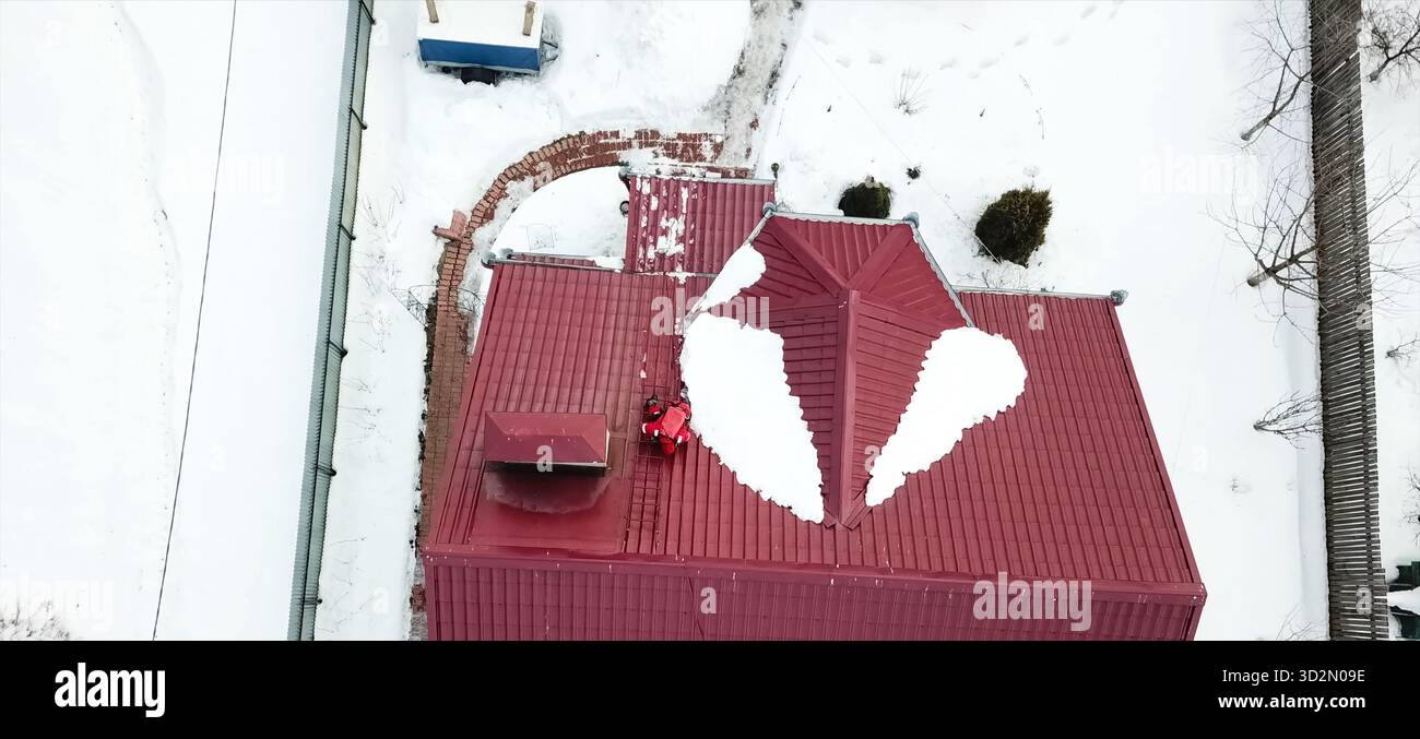 Worker does the installation of the roof of the house. Installation of ...