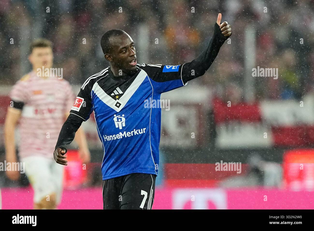 Hamburg's Jean-Luc Dompe celebrates after scoring his side's opening ...