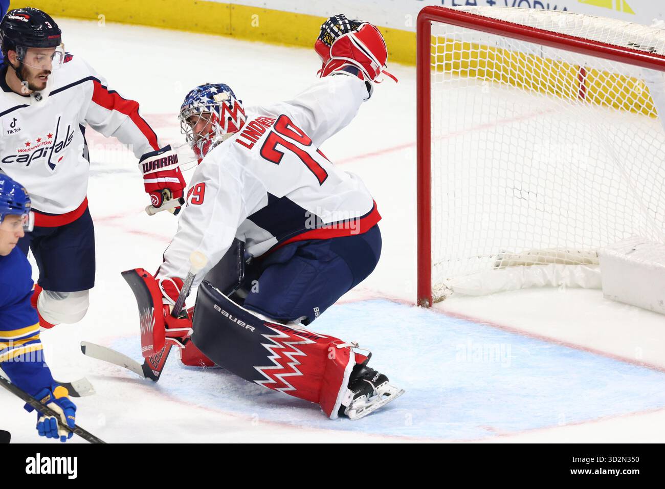 Washington Capitals goaltender Charlie Lindgren (79) makes a save ...