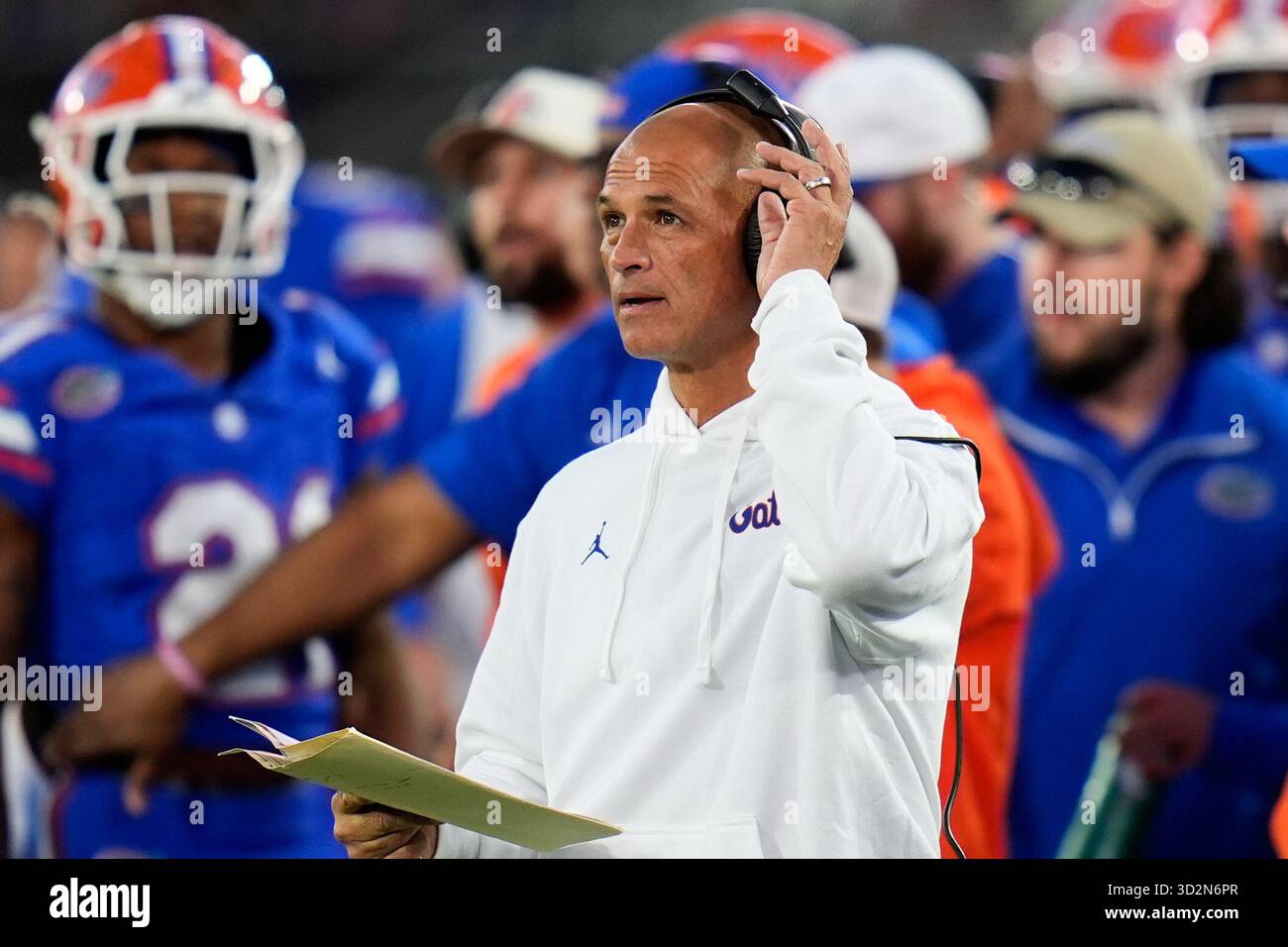 Florida interim head coach Billy Gonzales directs his players during ...