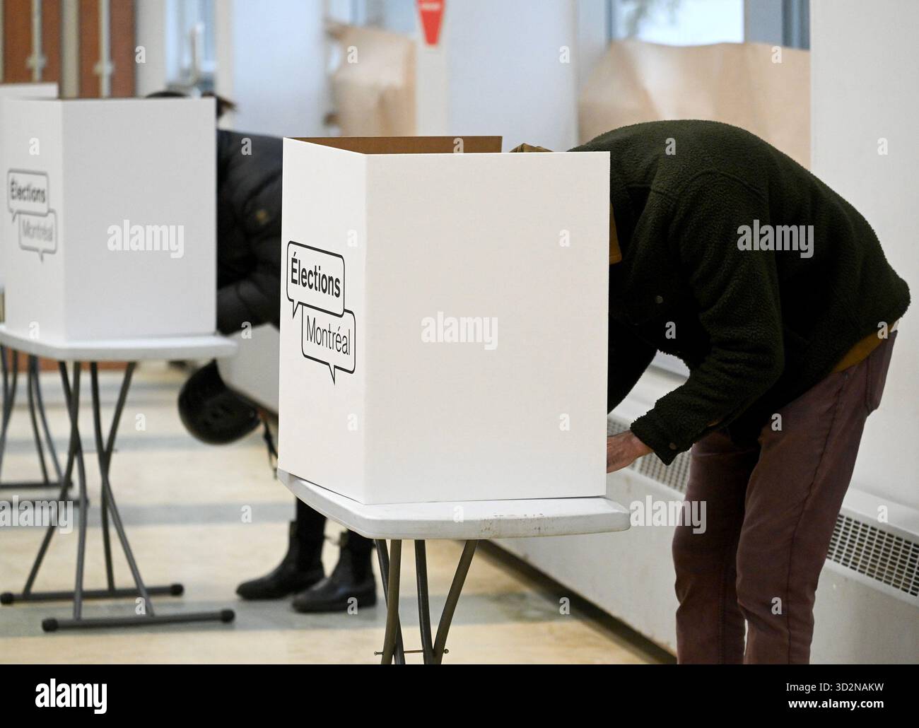 People cast their ballots on municipal election day in Montreal, Sunday ...