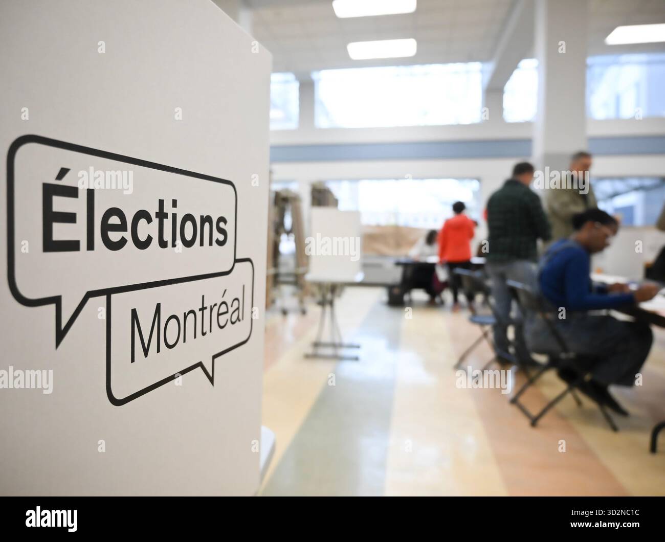 People cast their ballots at a polling station on municipal election ...