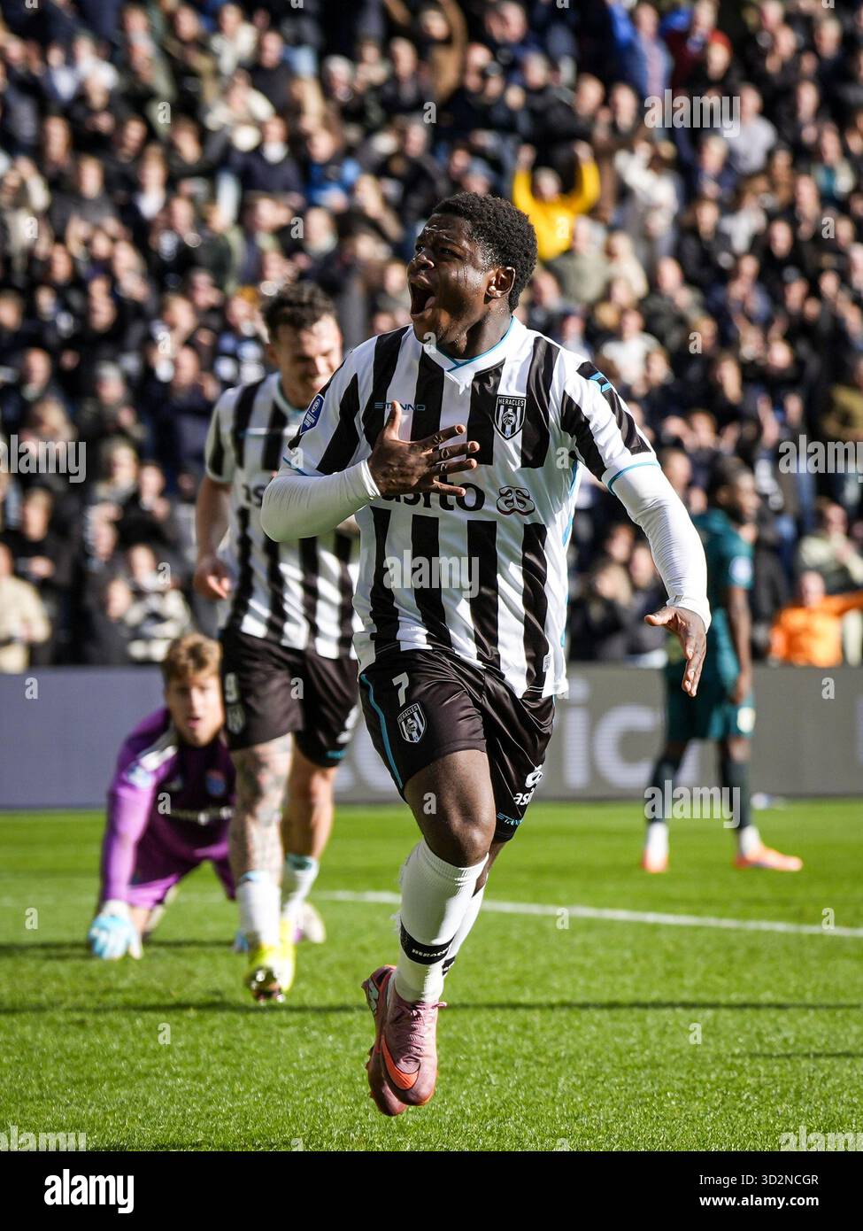 ALMELO - Bryan Limbombe of Heracles Almelo celebrates the 6-1 goal ...