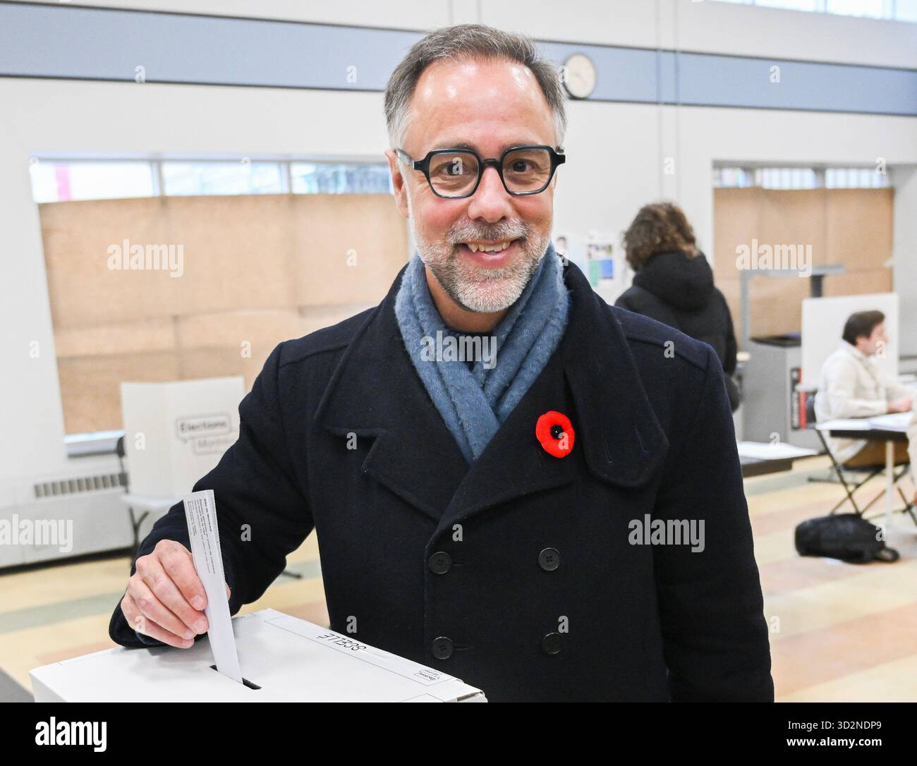 Projet Montréal leader and mayoral candidate Luc Rabouin casts his ...