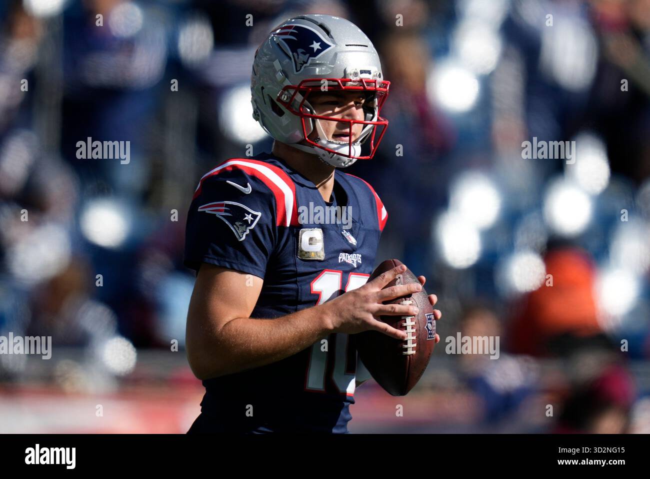 New England Patriots quarterback Drake Maye (10) warms up before an NFL ...