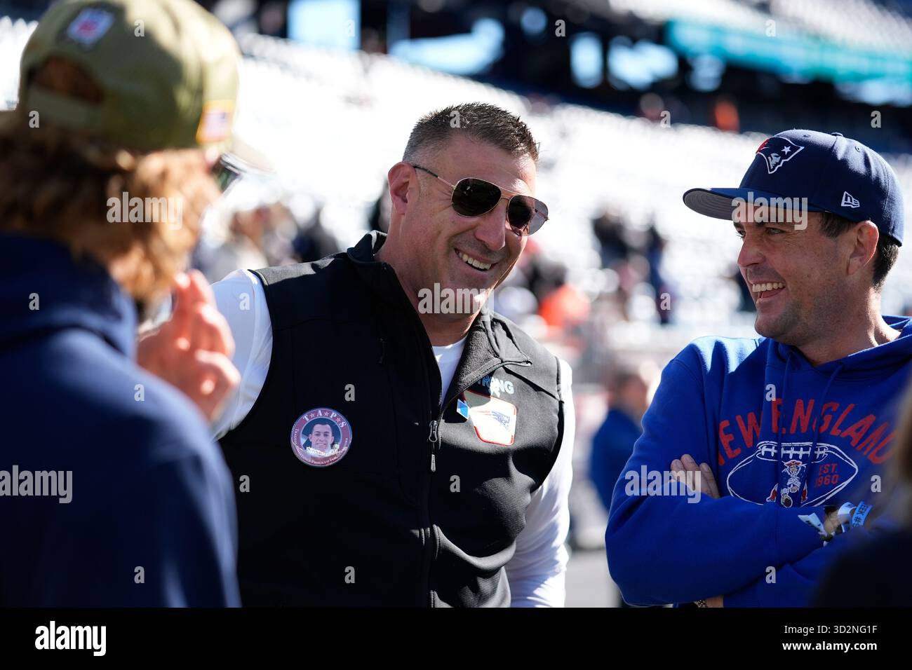 New England Patriots head coach Mike Vrabel speaks with PGA golfer ...