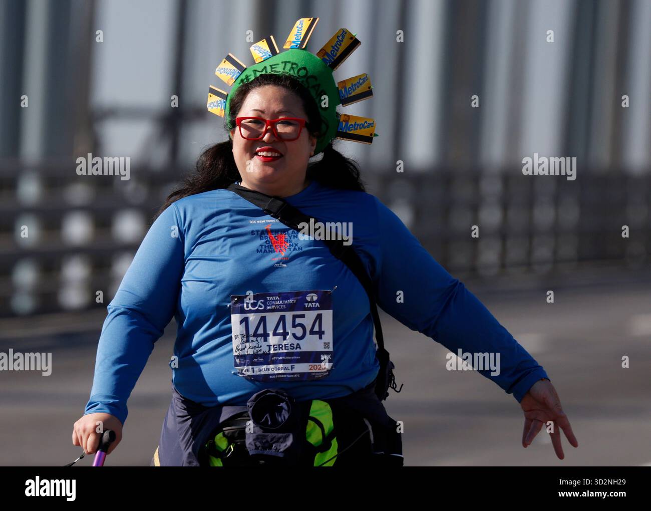A runner wears MTA mass transit subway cards as a head piece while ...