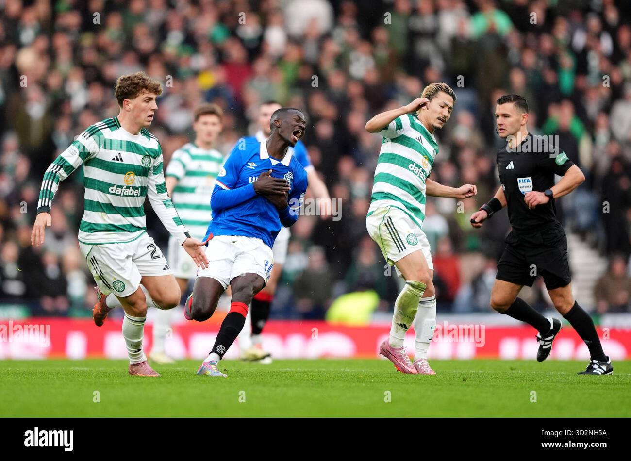 Rangers' Mohammed Diomande reacts to a challenge from Celtic's Callum ...