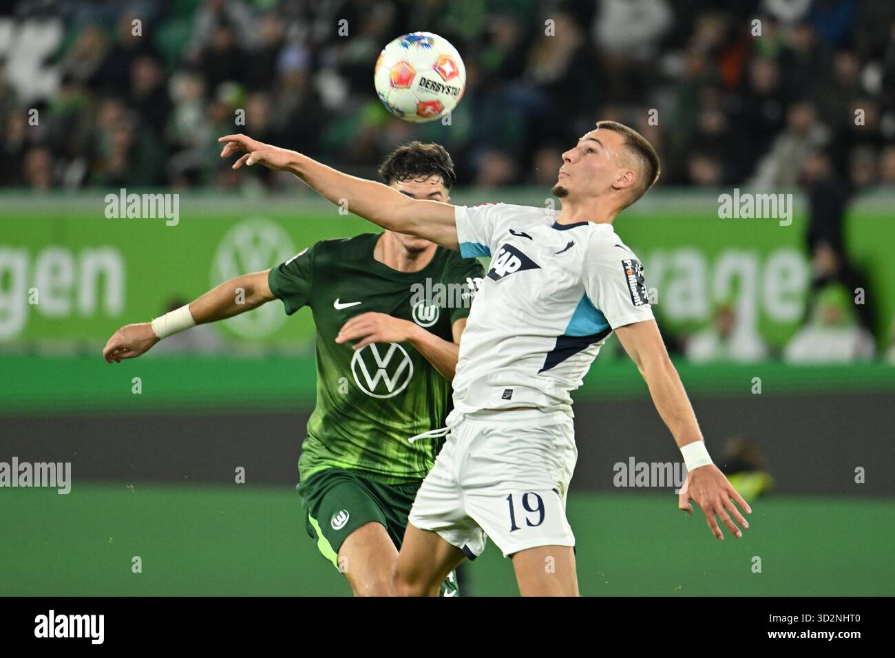Hoffenheim's Tim Lemperle, right, and Wolfsburg's Jenson Seelt in ...