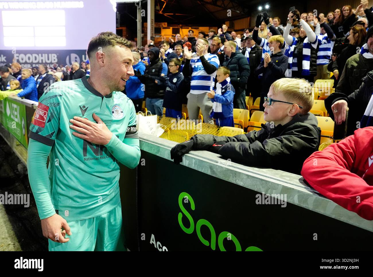 Maldon and Tiptree's Freddie Sears with fans after the Emirates FA Cup ...