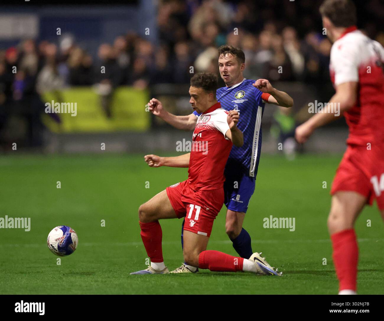 Gainsborough Trinity's Bobby Johnson (left) and Accrington Stanley's ...