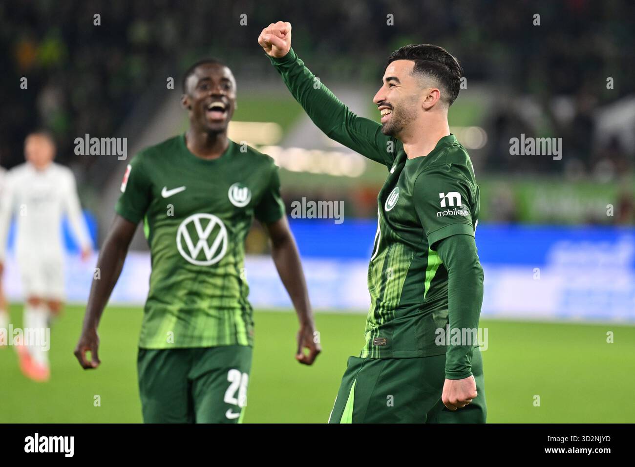 Wolfsburg's Mohamed Amoura celebrates scoring during the Bundesliga ...