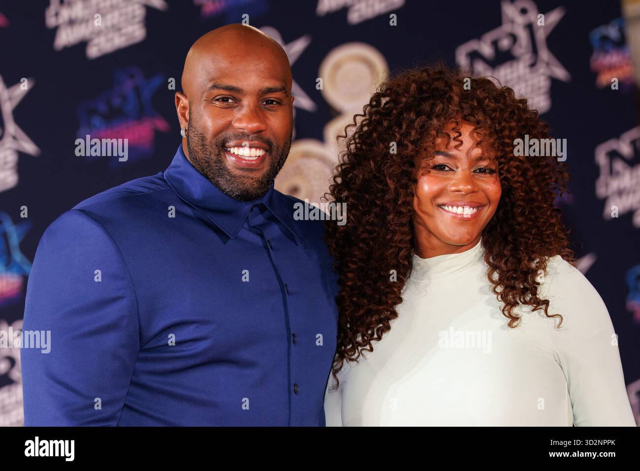 Teddy Riner and Luthna Plocus attends the 27th NRJ MUSIC AWARDS at ...