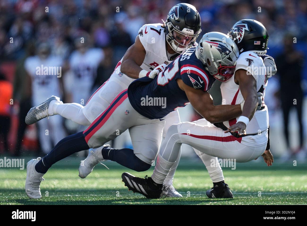 New England Patriots linebacker Christian Elliss (53) hits Atlanta ...