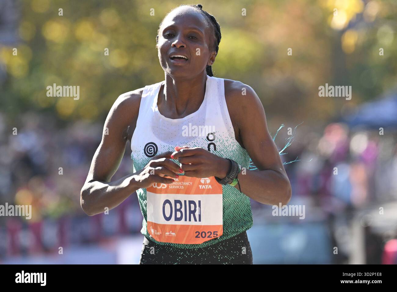 Professional Women's Division's Hellen Obiri of Kenya celebrates ...
