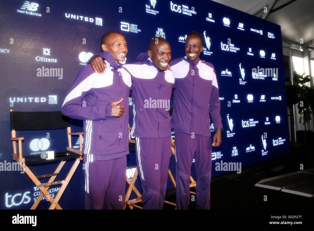 Alexander Mutiso, Benson Kipruto and Albert Korir pose for a photo at the press conference after ...